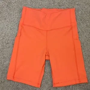 Athleta | Shorts | Athleta Coral Orange Ultimate Stash Pocket 7 Short ...